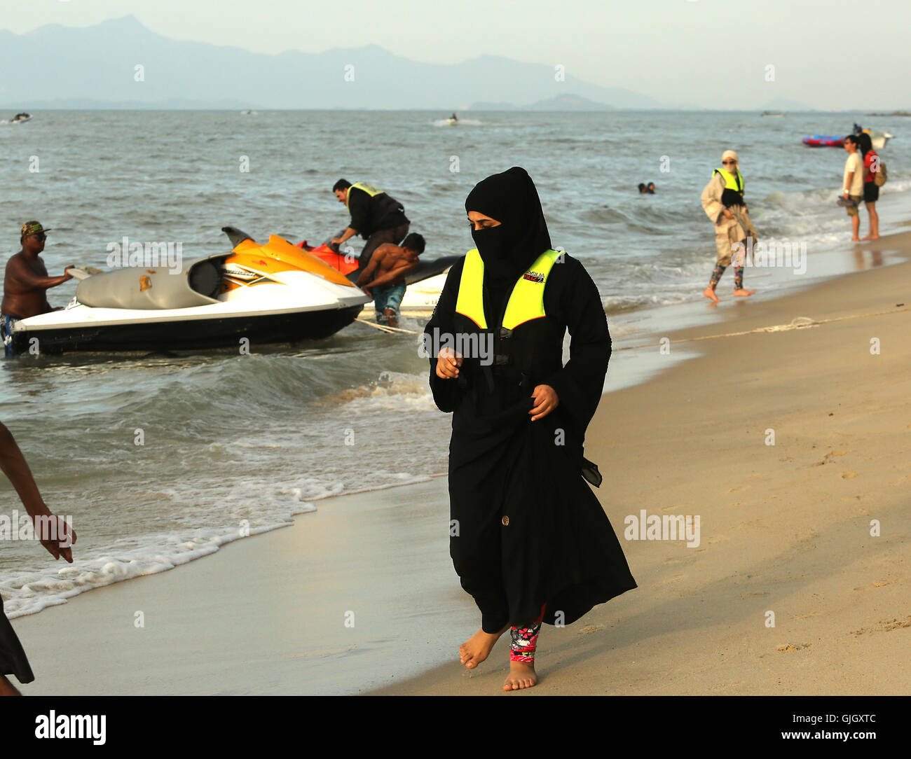 Penang, MALAYSIA. 24th Feb, 2016. A Muslim woman wearing a full burqa ...