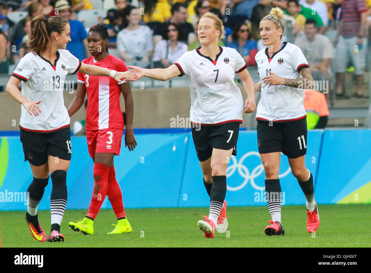 Canada olympics football celebrates hi-res stock photography and images ...