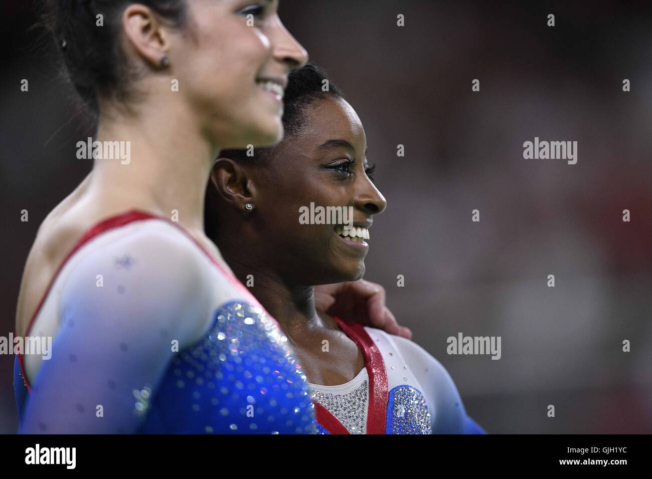 Rio De Janeiro, Brazil. 16th Aug, 2016. Simone Biles (R) of the United ...