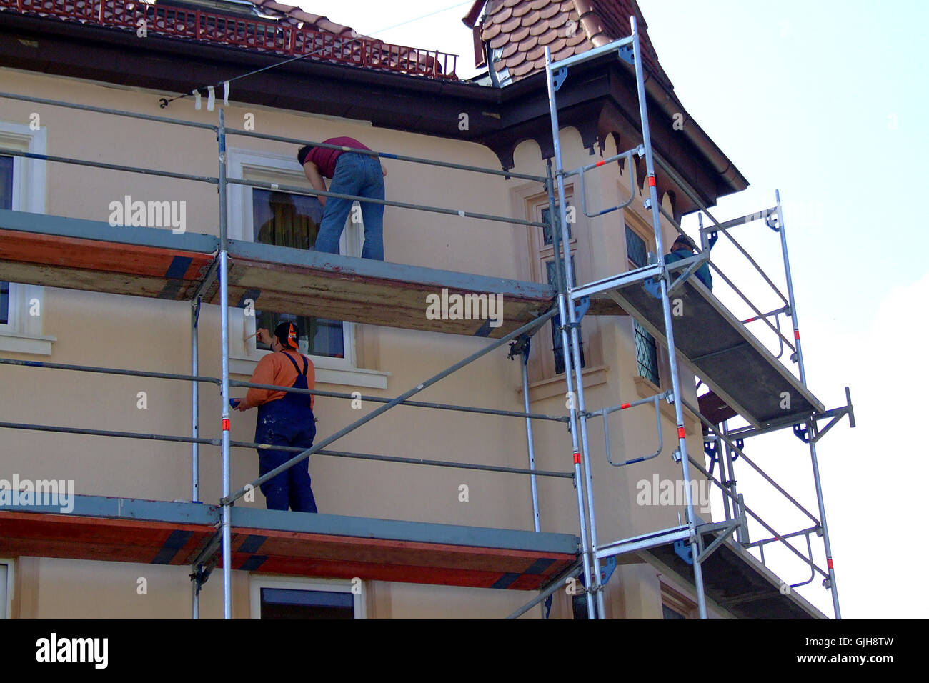 house building men Stock Photo - Alamy