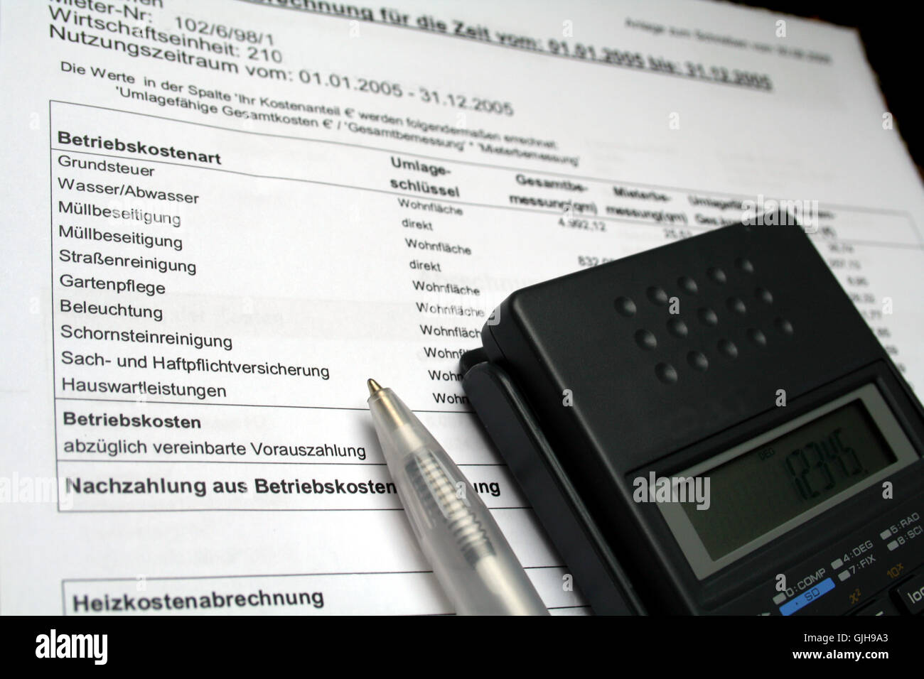 check accounting pocket calculator Stock Photo - Alamy