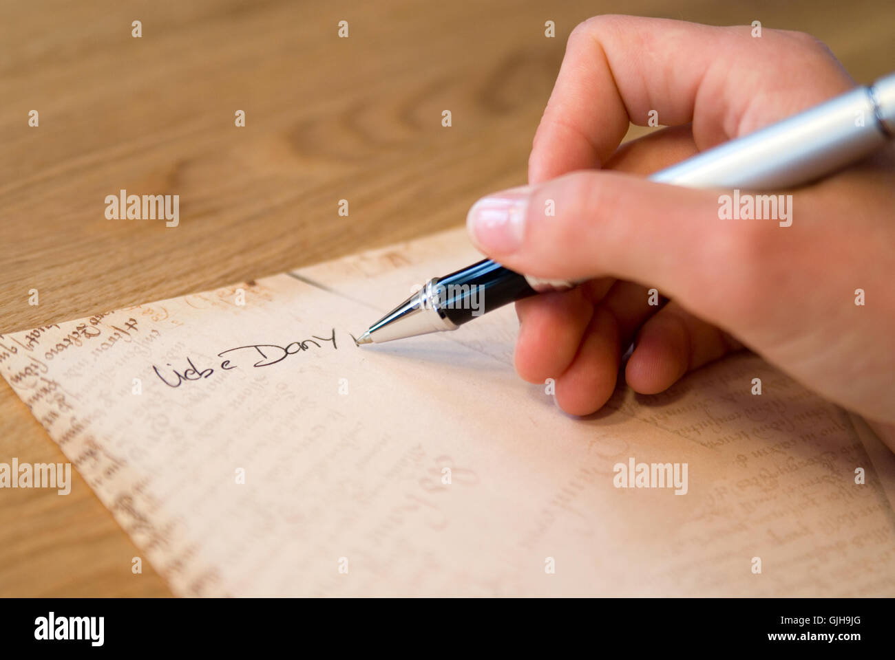 woman hand write Stock Photo - Alamy