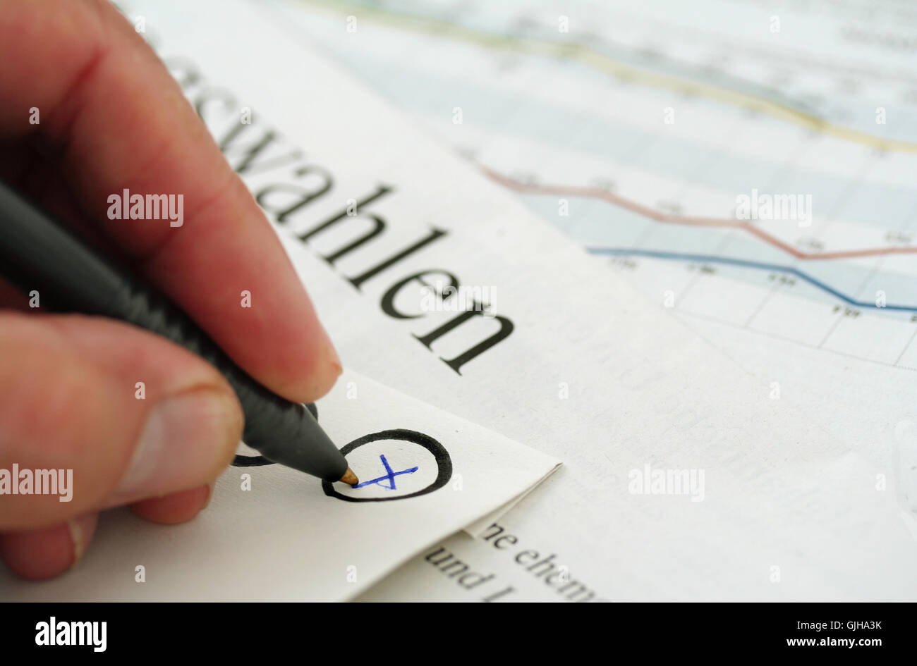 newspaper journal cross Stock Photo - Alamy