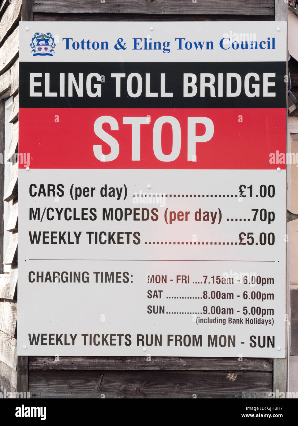 Sign showing tariffs at Eling Toll Bridge, Eling, Hampshire, England ...