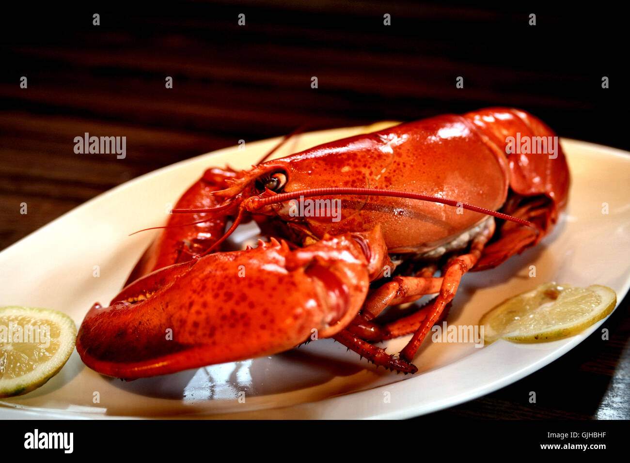 lobster boiled lemons Stock Photo - Alamy