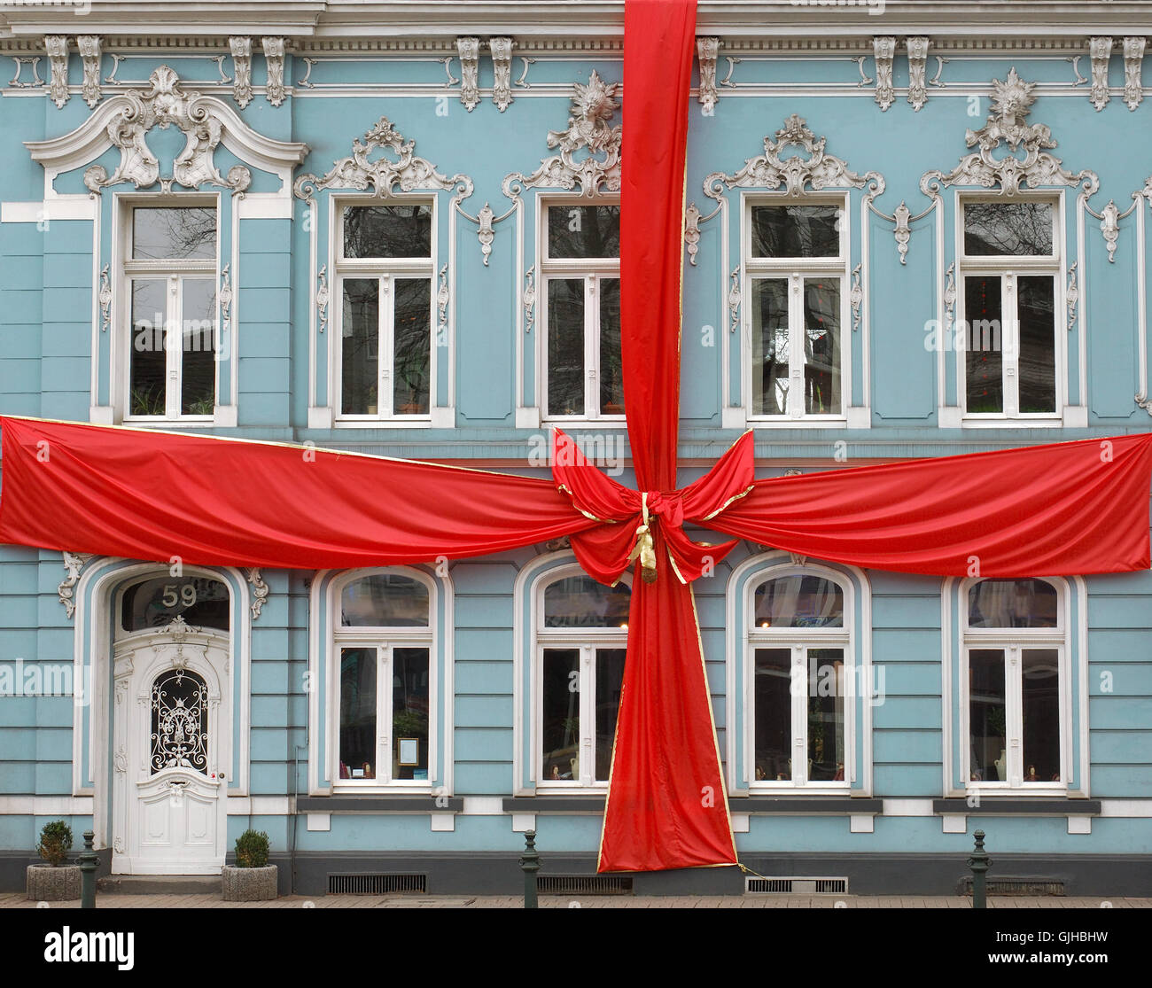 house with red bow Stock Photo - Alamy