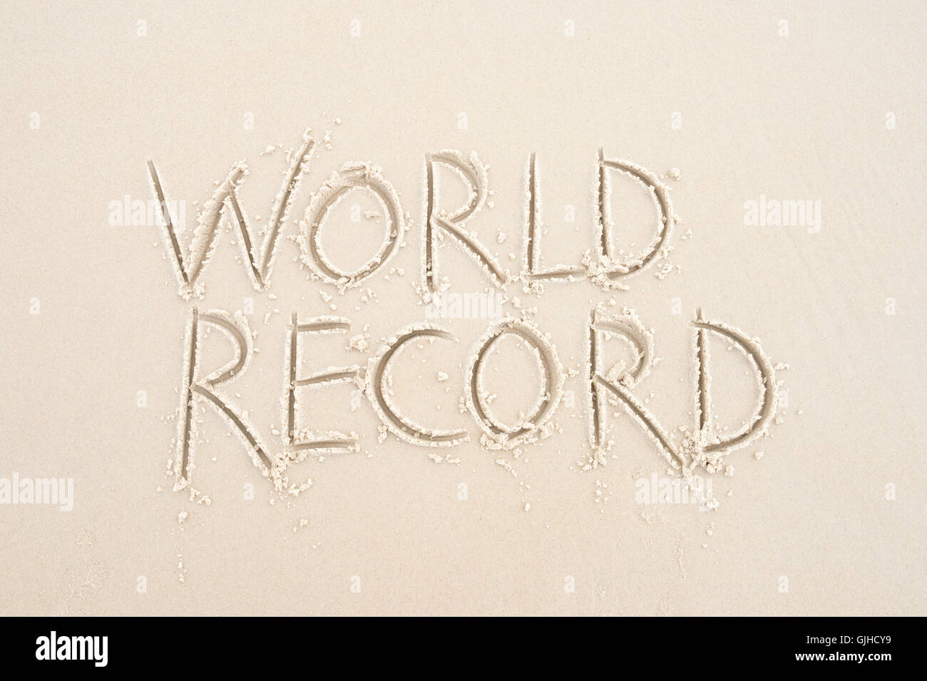 Message for World Record written in smooth sand on the beach in Rio de ...