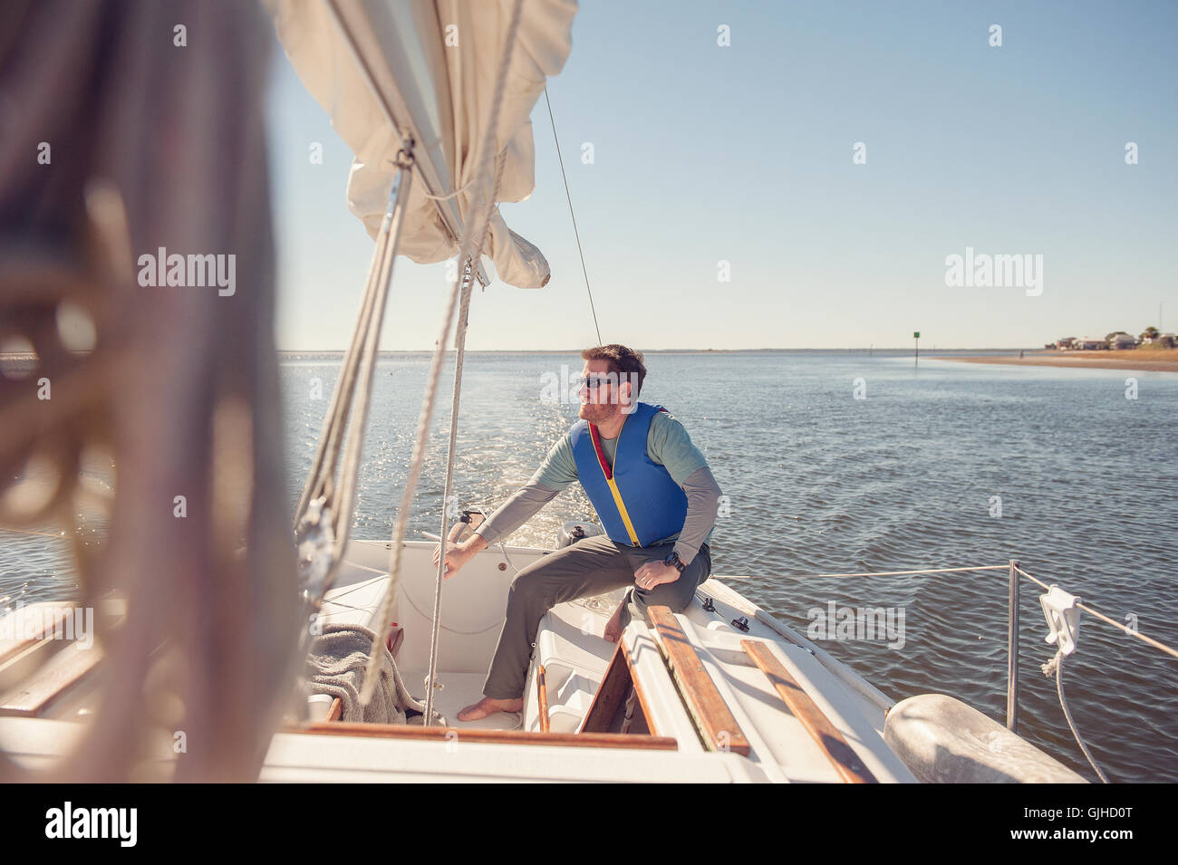 Man sailing sailboat, Florida, United States Stock Photo - Alamy