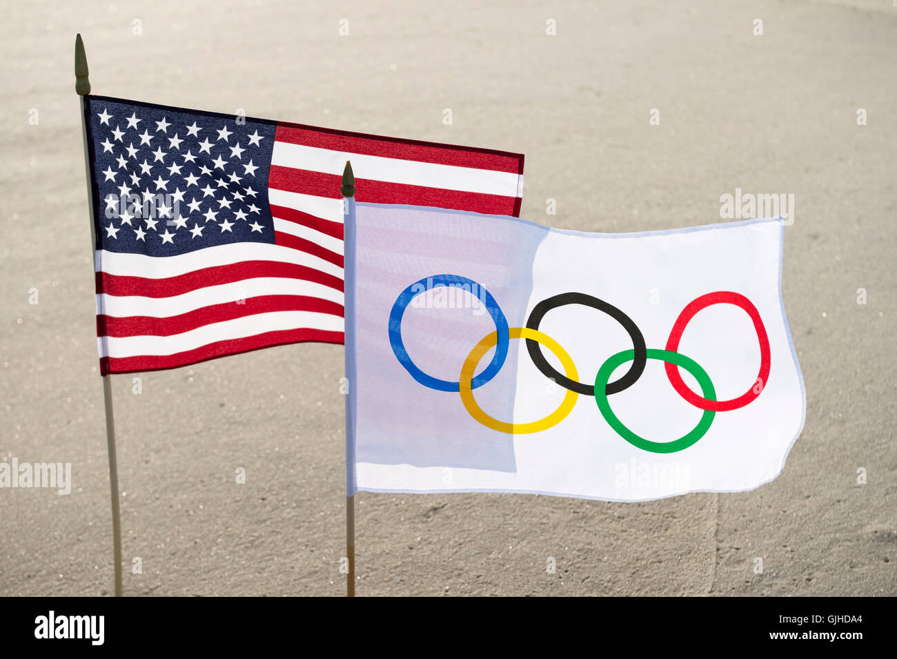 Olympic symbol rings on flags hi-res stock photography and images - Alamy