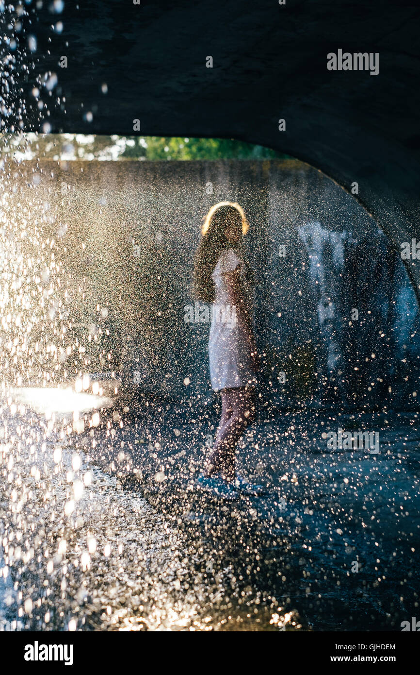 Woman splashing in water hi-res stock photography and images - Alamy