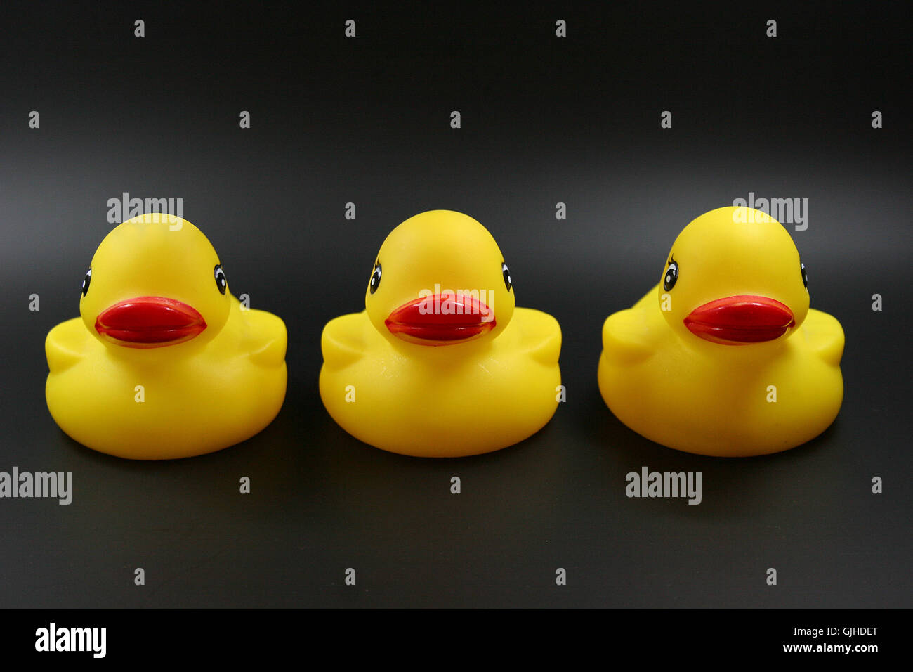 Three abreast hi-res stock photography and images - Alamy