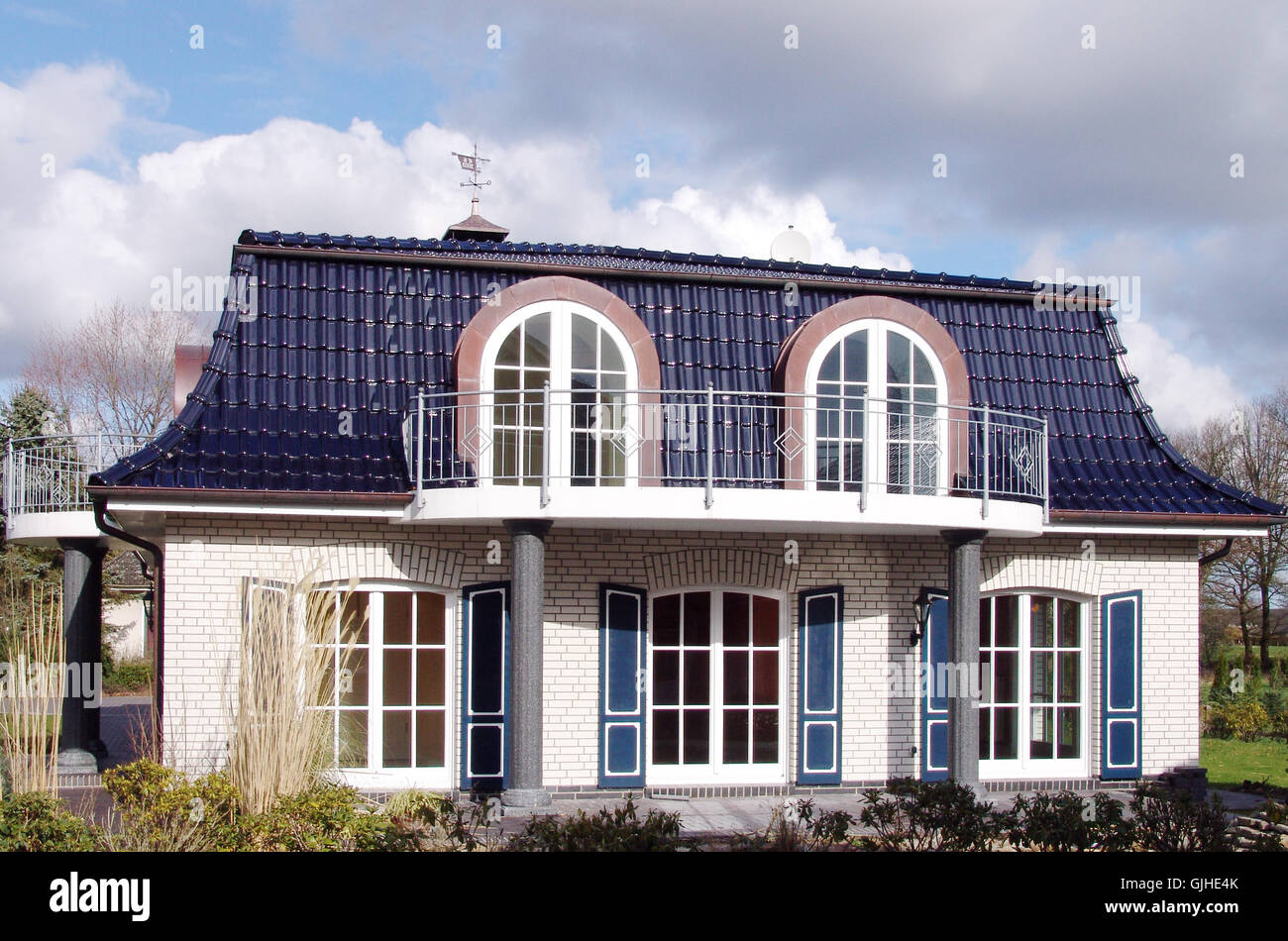 blue house building Stock Photo - Alamy