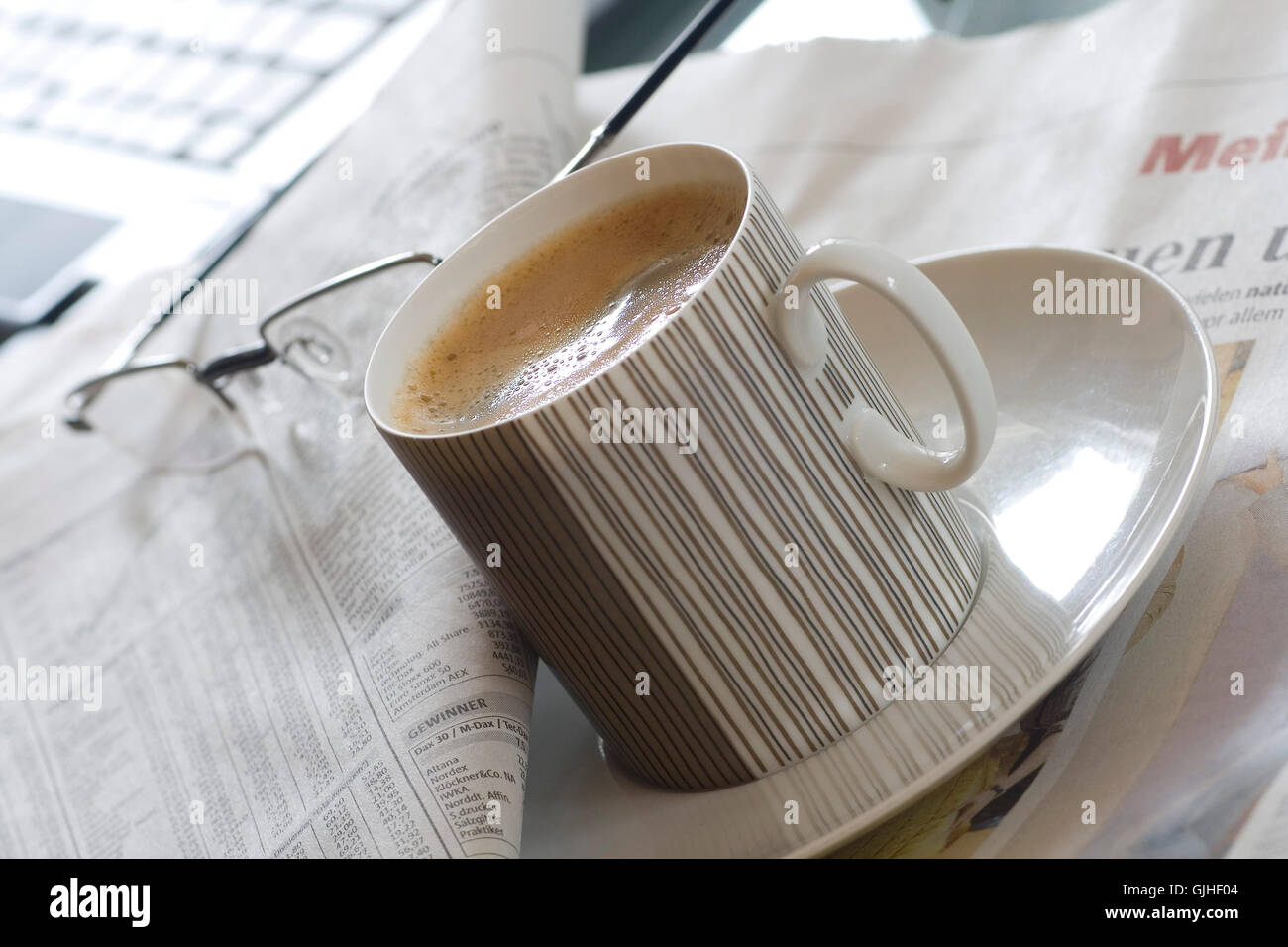 newspaper journal cup Stock Photo - Alamy