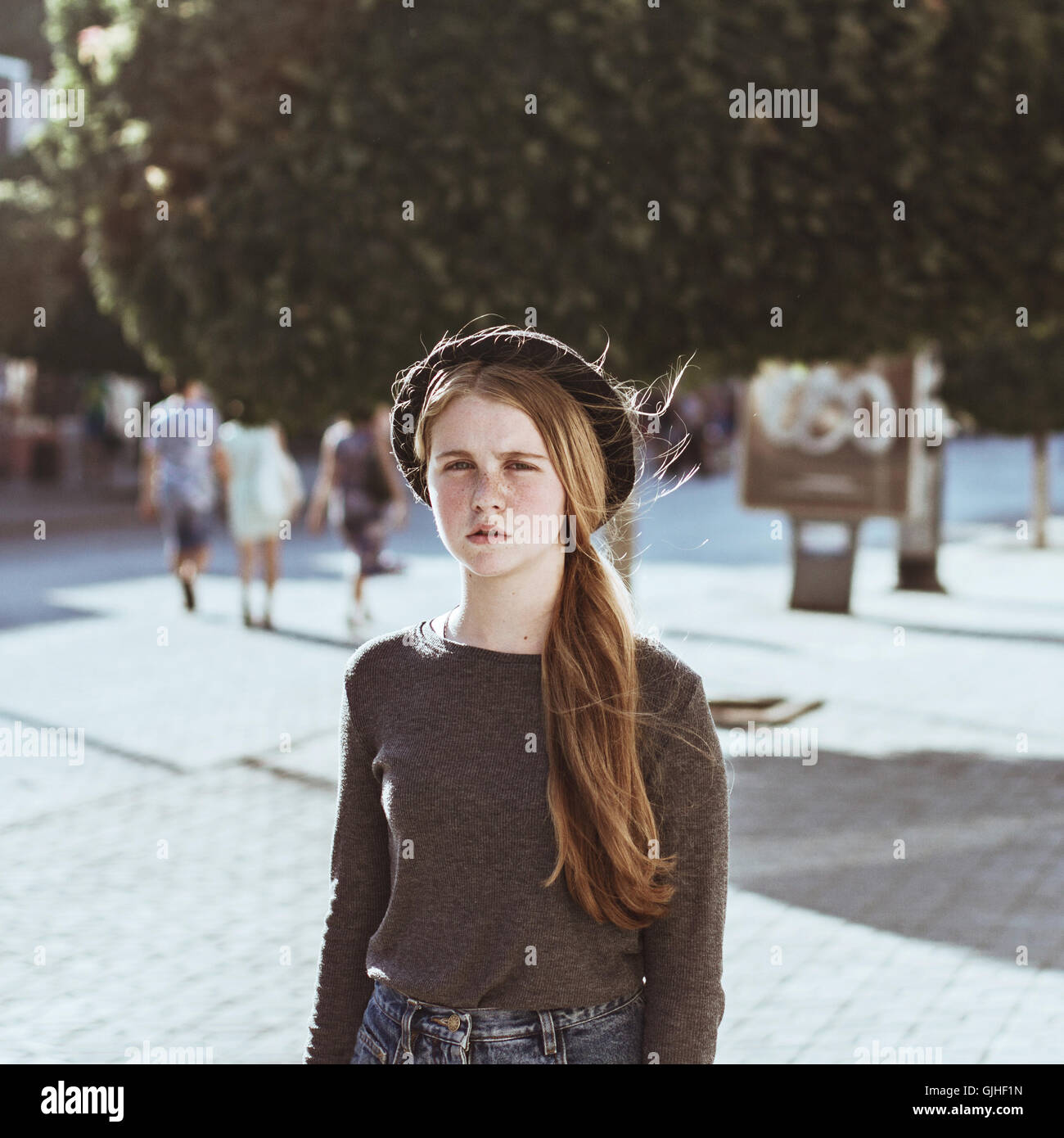 Portrait of a teenage girl standing in street Stock Photo - Alamy