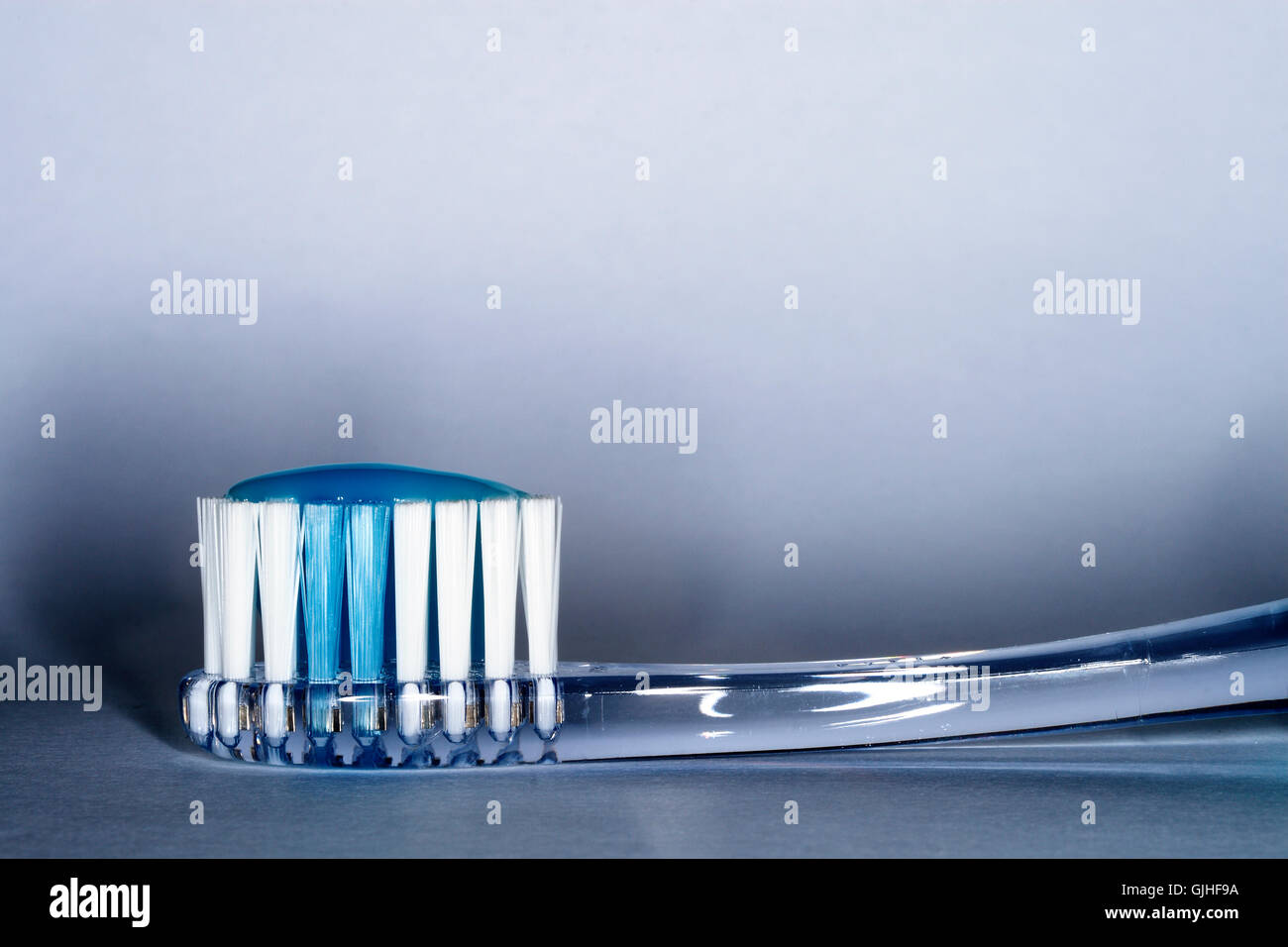 toothbrush with toothpaste Stock Photo - Alamy