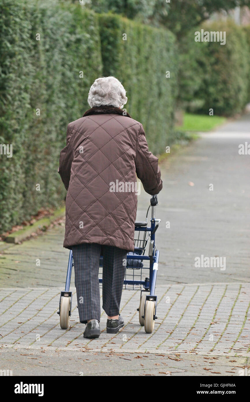 woman with walker Stock Photo - Alamy