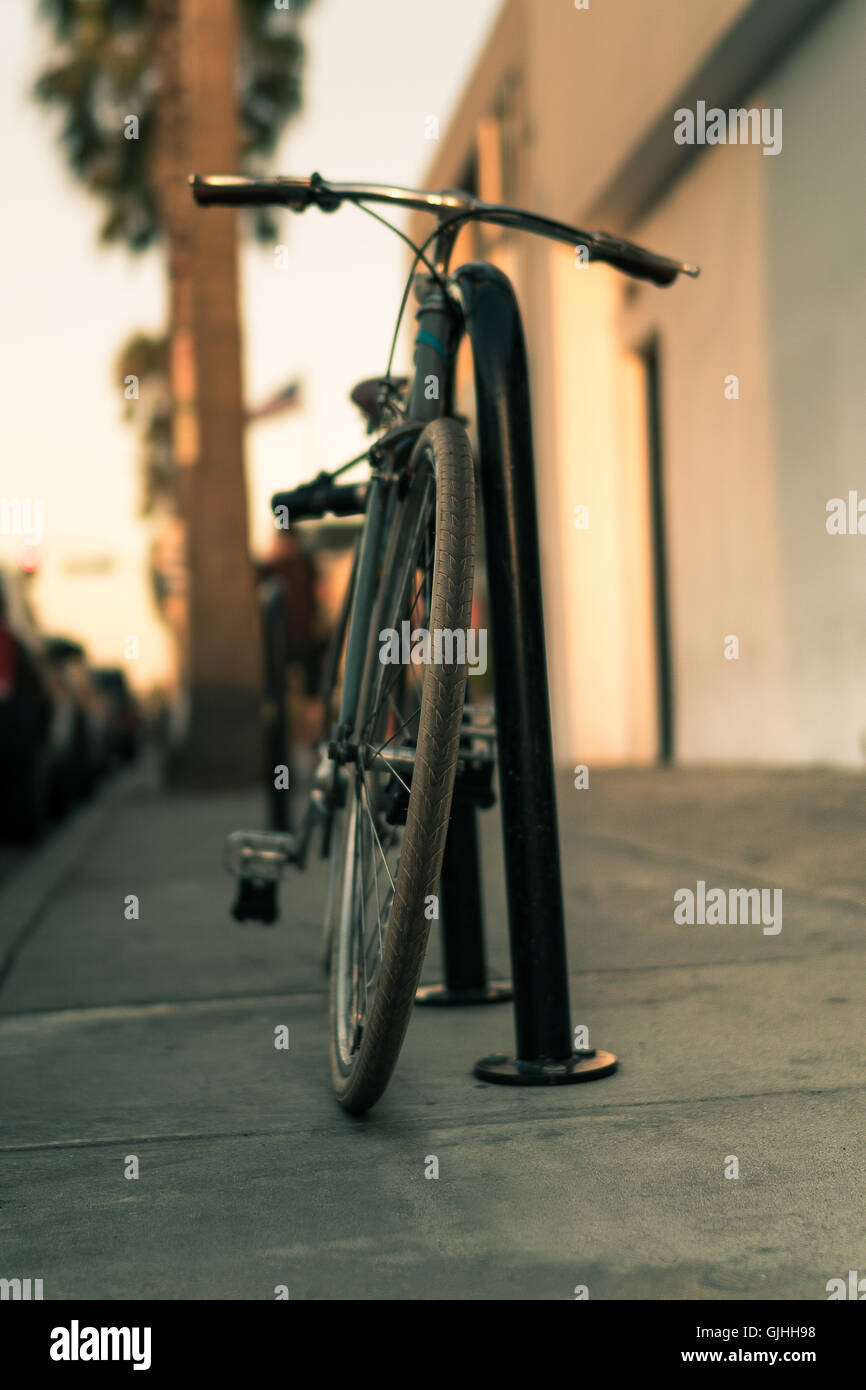 Bicycle Parked in street Stock Photo - Alamy