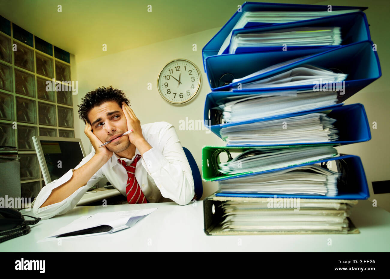 Man surrounded by paperwork hi-res stock photography and images - Alamy