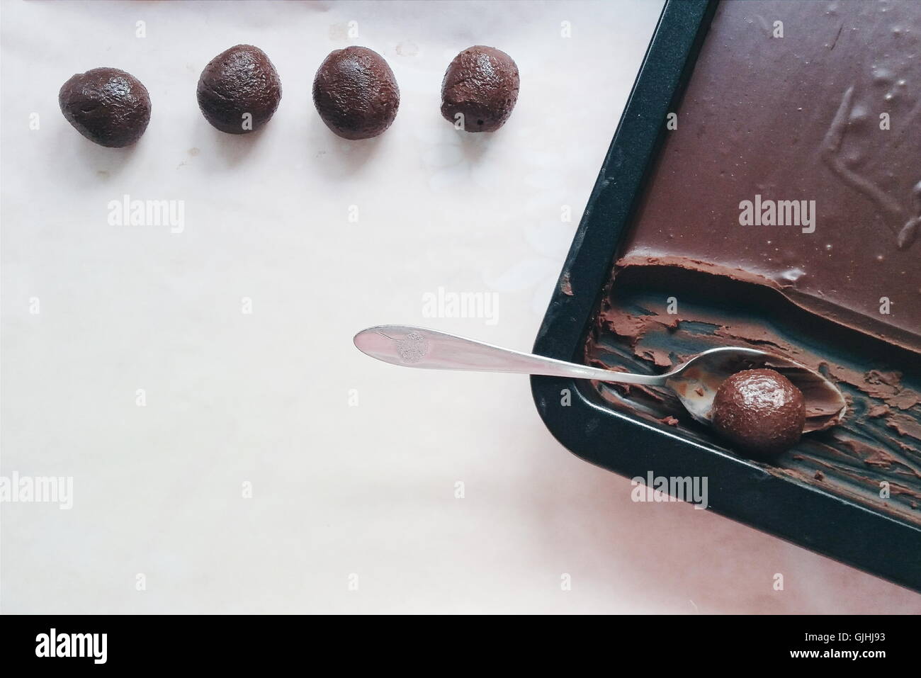 Chocolate truffles and truffle mixture in baking tray Stock Photo - Alamy