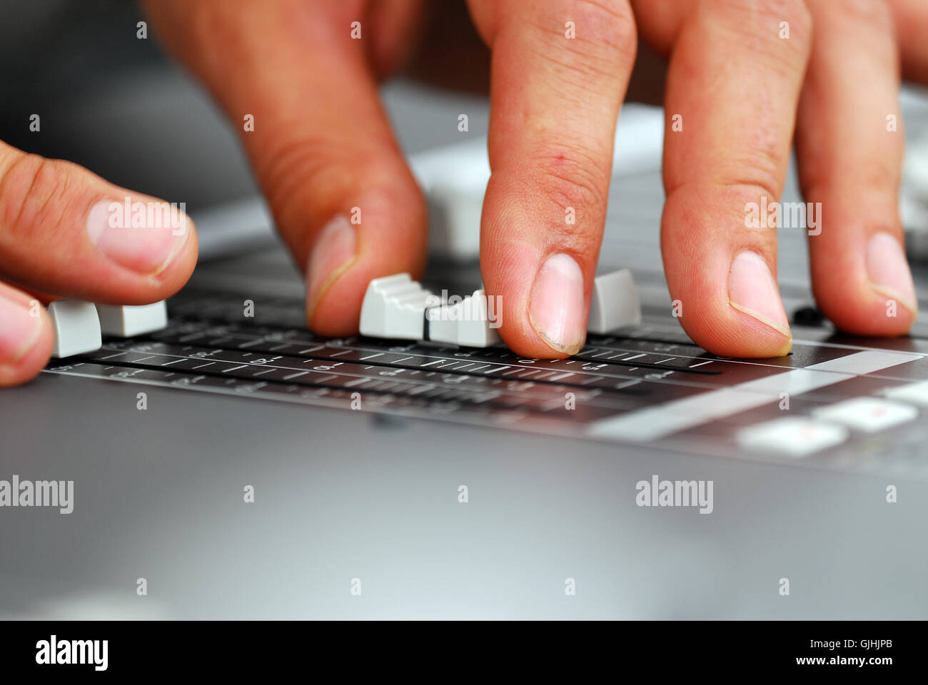 hand finger electronics Stock Photo - Alamy