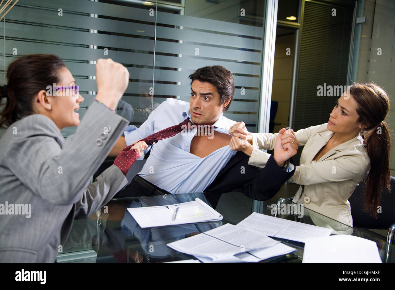 office fight fighting Stock Photo - Alamy