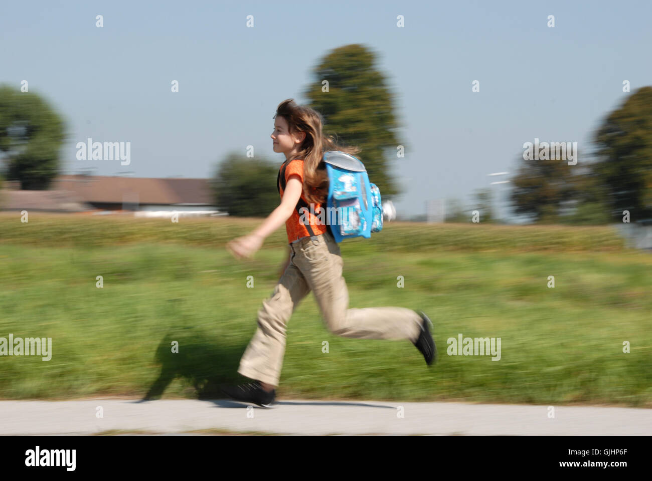 Child running late for school bus hi-res stock photography and images ...