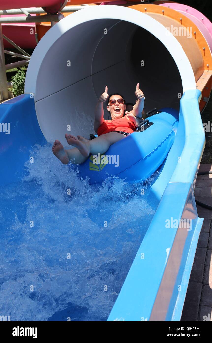 Mother daughter enjoy water slide hi-res stock photography and images ...