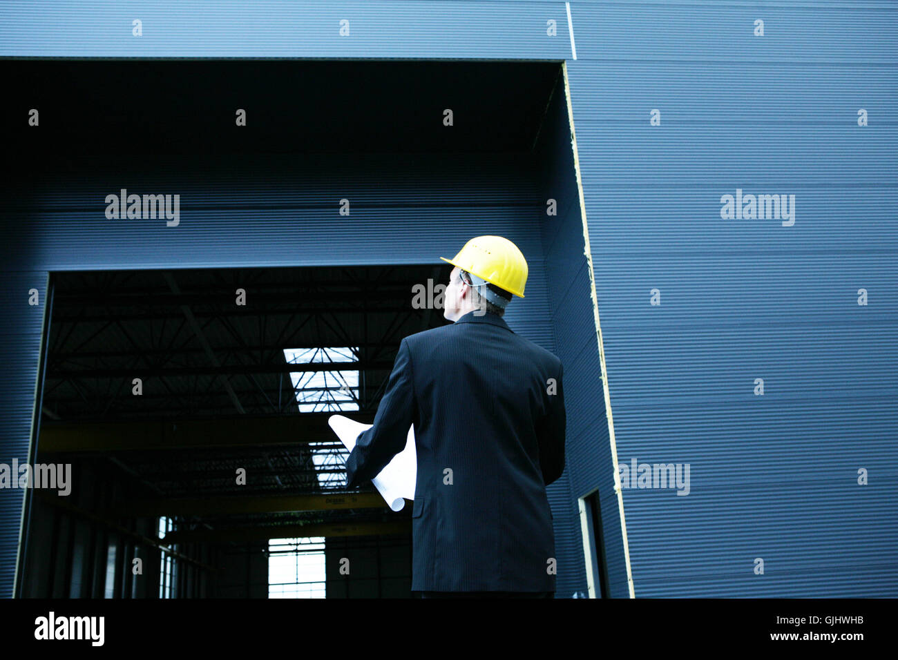 architect building owner construction plan Stock Photo - Alamy
