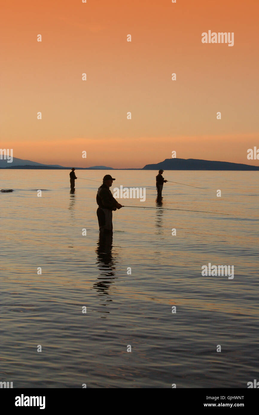 men man sunset Stock Photo - Alamy