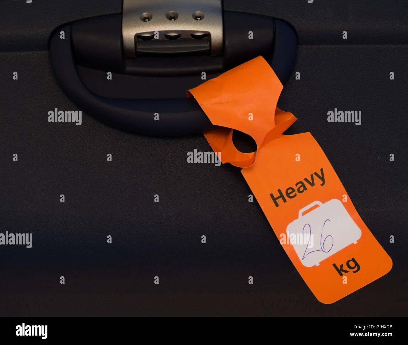 Overweight baggage tag hi-res stock photography and images - Alamy