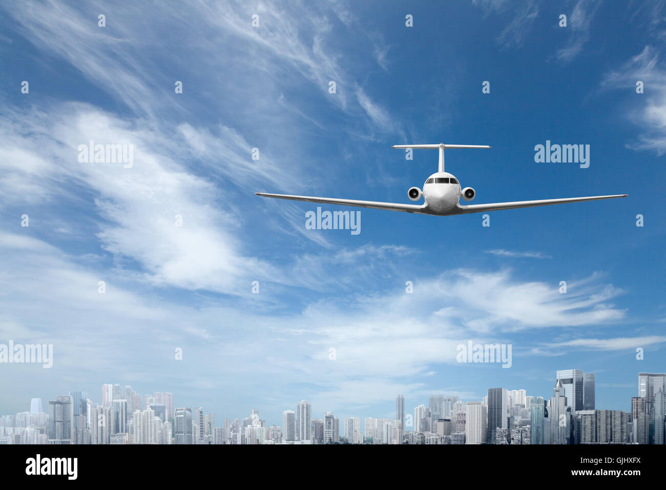 Aeroplane flying above buildings High Resolution Stock Photography and ...