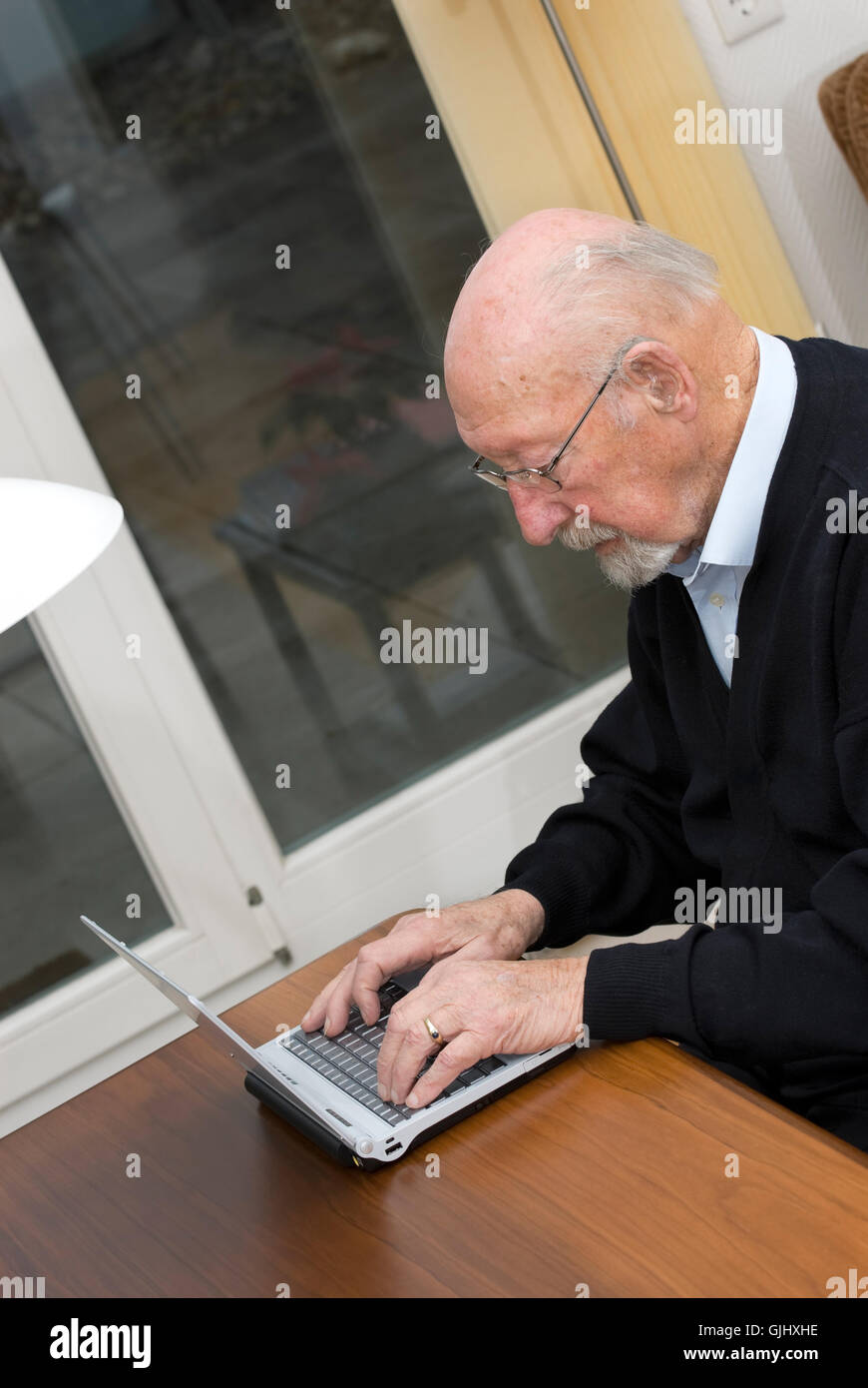 active retirees with computer Stock Photo - Alamy
