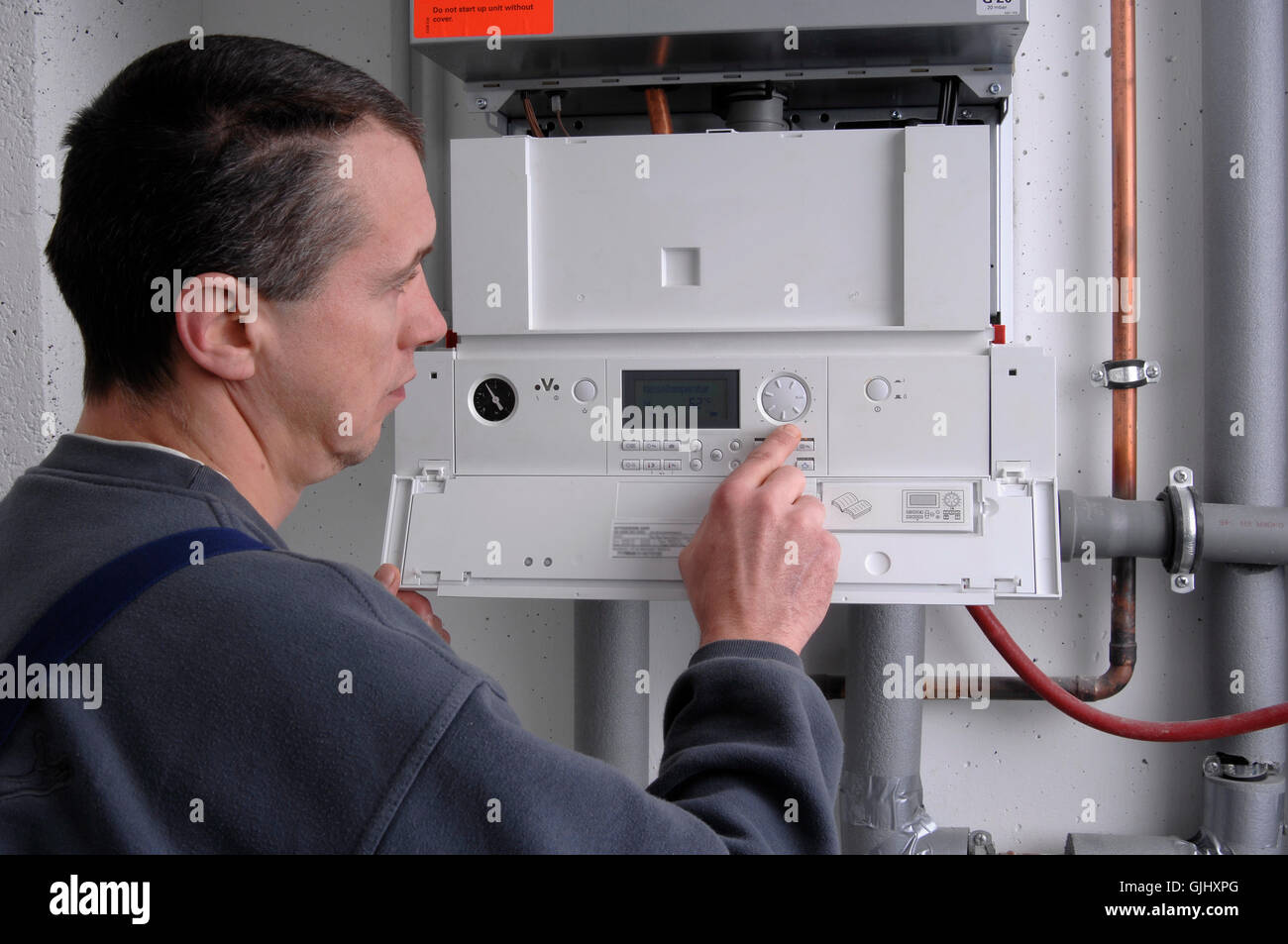 maintenance of a heating system Stock Photo - Alamy