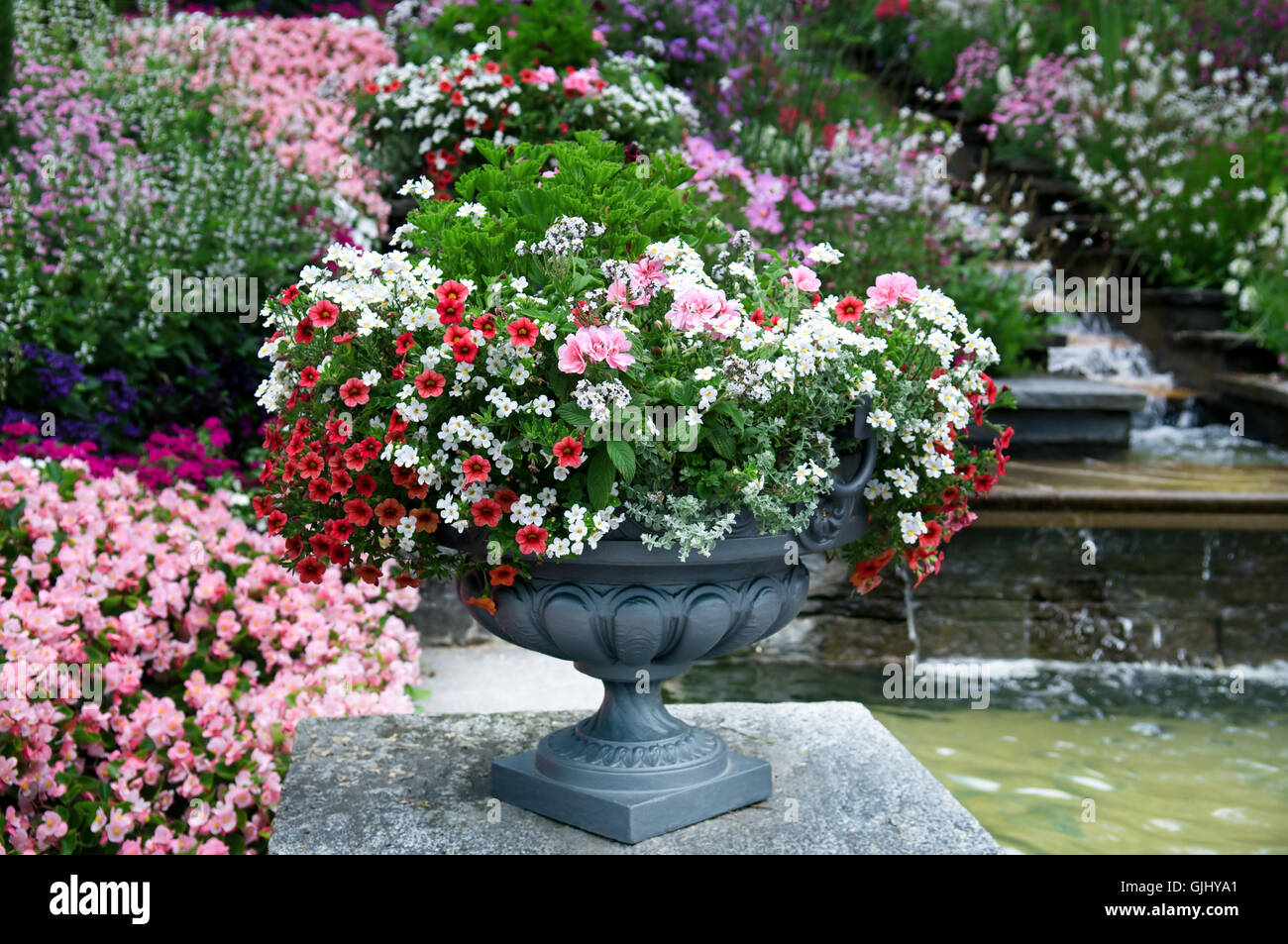 beautiful flower beds and waterfall Stock Photo - Alamy