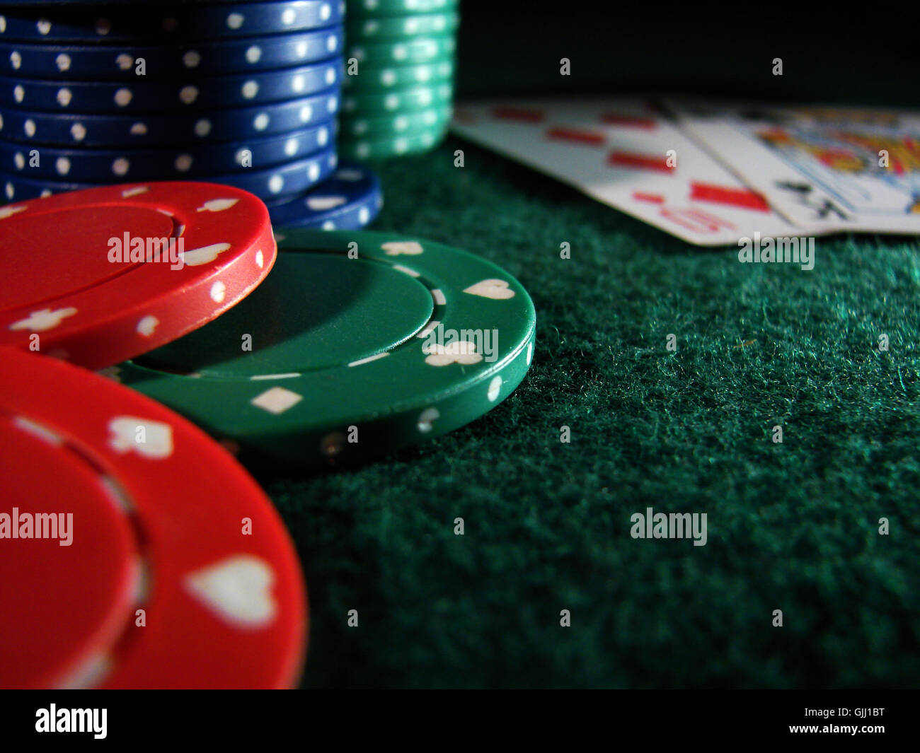 poker chips and playing cards 2 Stock Photo - Alamy