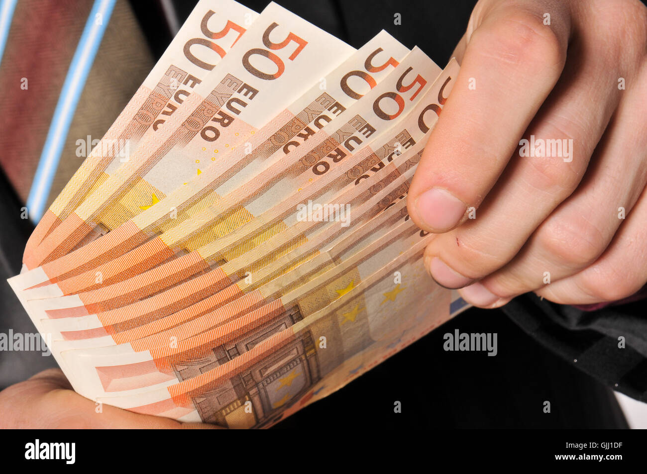 500 note with hand hi-res stock photography and images - Alamy