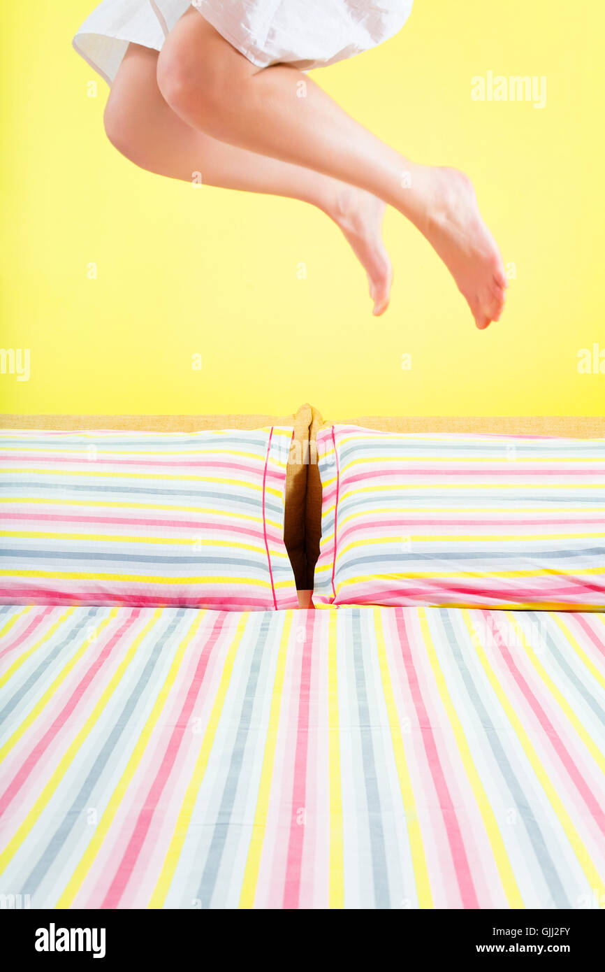 Woman bouncing bed hi-res stock photography and images - Alamy