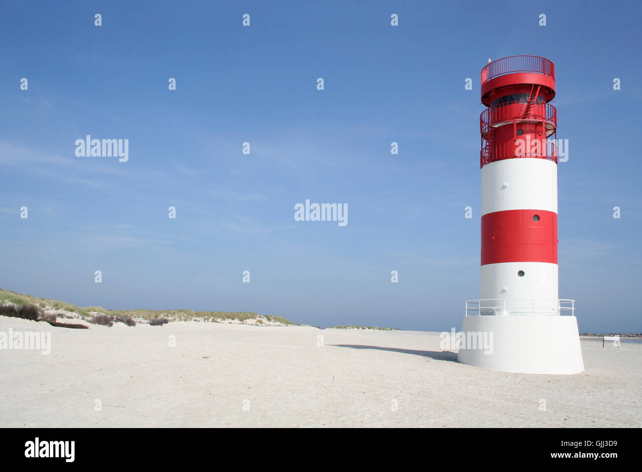 lighthouse dune cross Stock Photo - Alamy