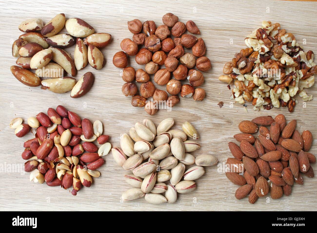 Pistachios and peanuts hi-res stock photography and images - Alamy