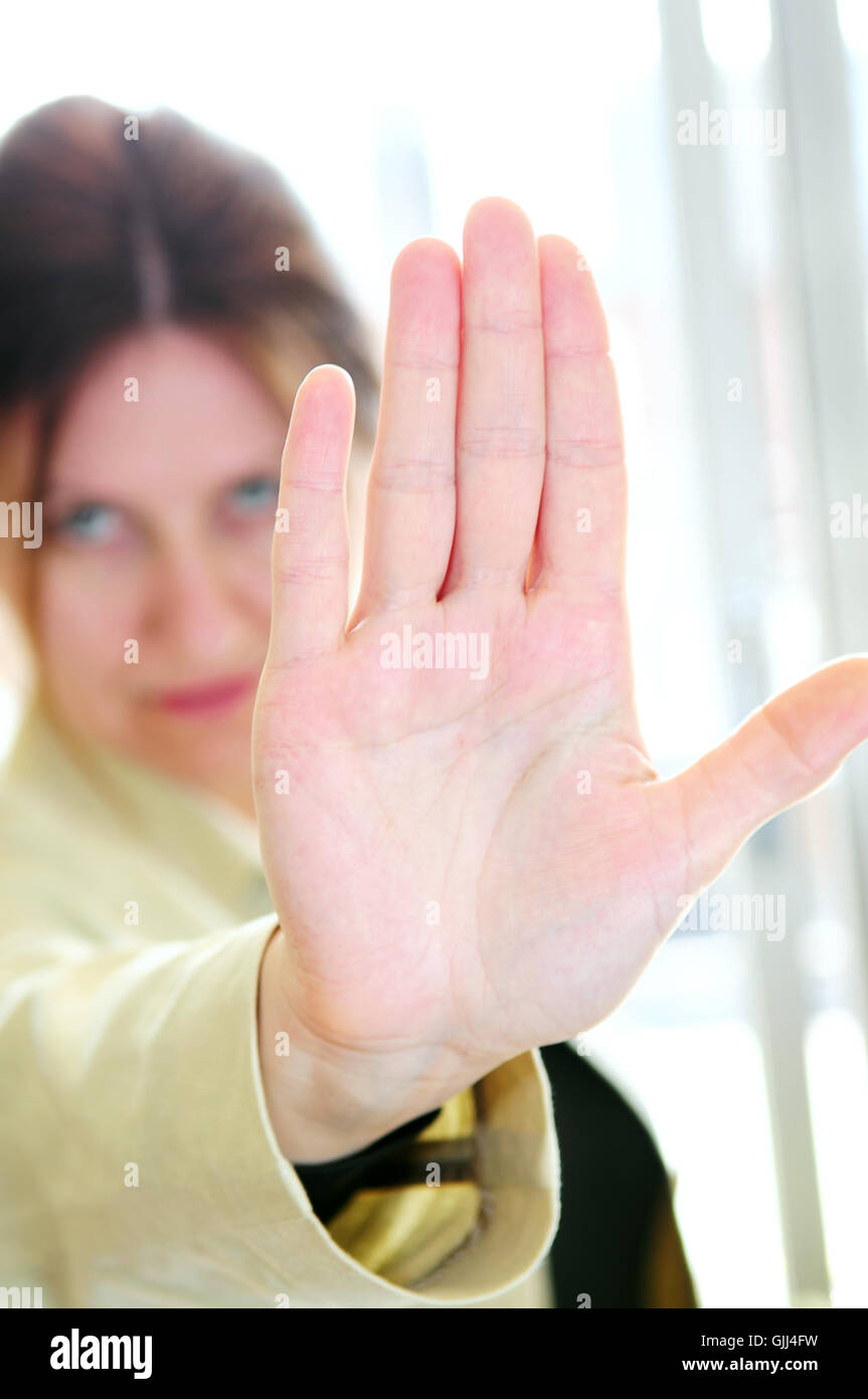 Businesswoman stopping hand gesture hi-res stock photography and images ...