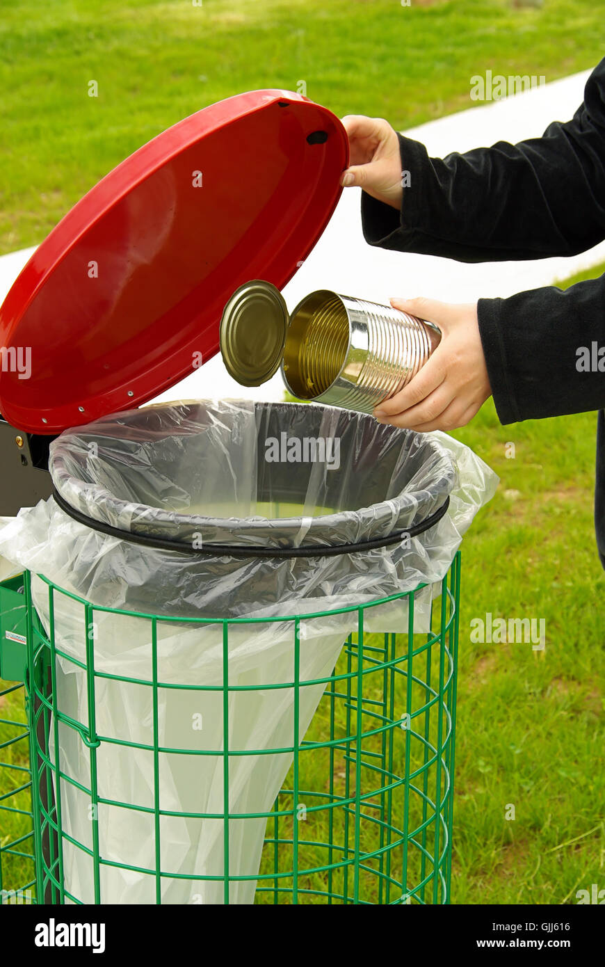 hand trash garbage can Stock Photo - Alamy