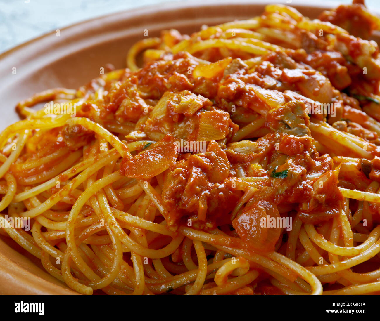 rustic italian spaghetti arrabbiata pasta fnd cod liver oil Stock Photo ...