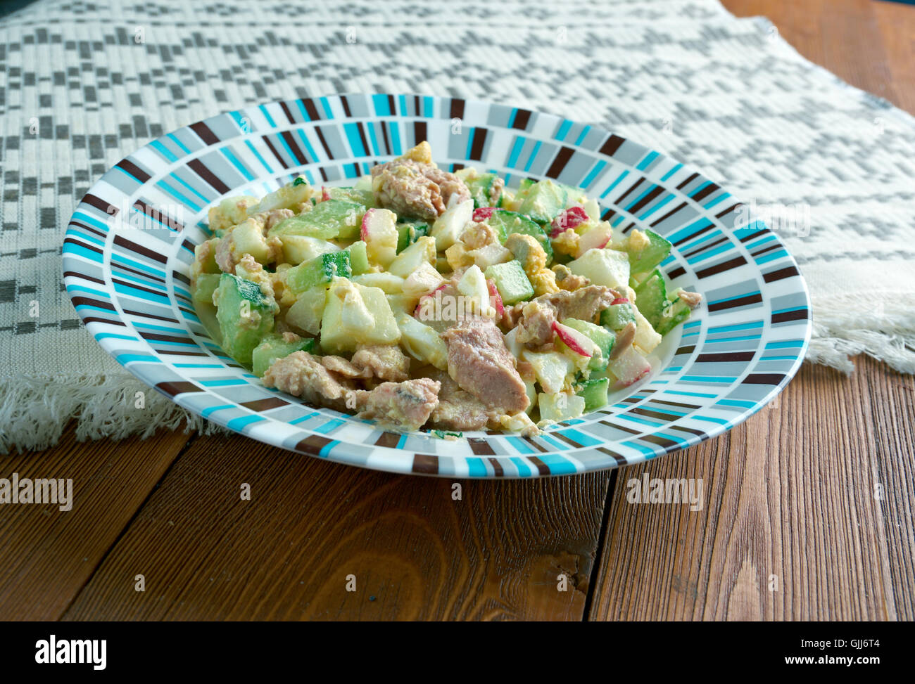 Russian Salad with cod liver and vegetables Stock Photo - Alamy