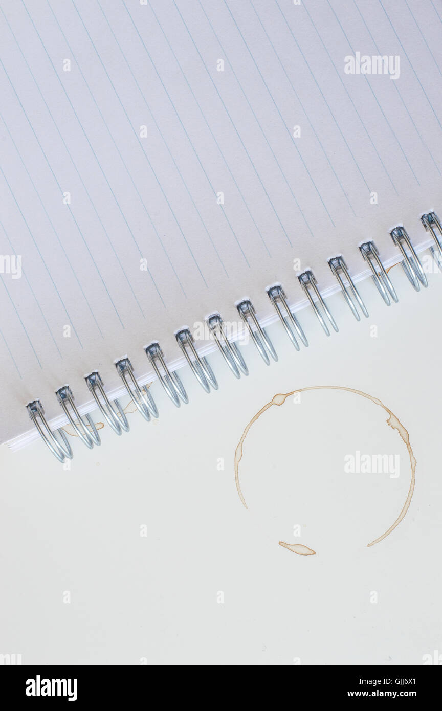 Coffee Stains and Notebook on White Background Stock Photo - Alamy