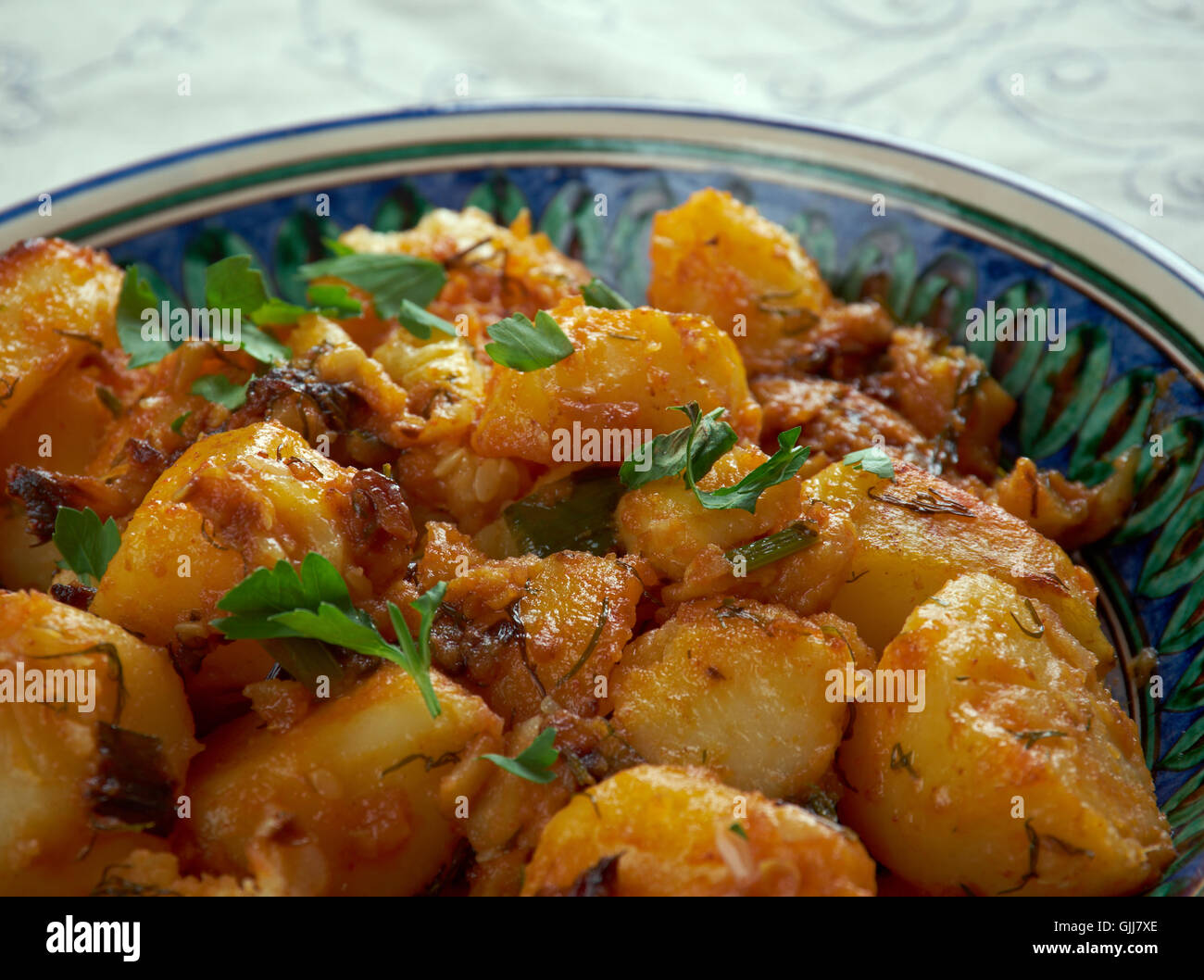 Lebanese Garlic Potatoes with Cilantro Stock Photo - Alamy