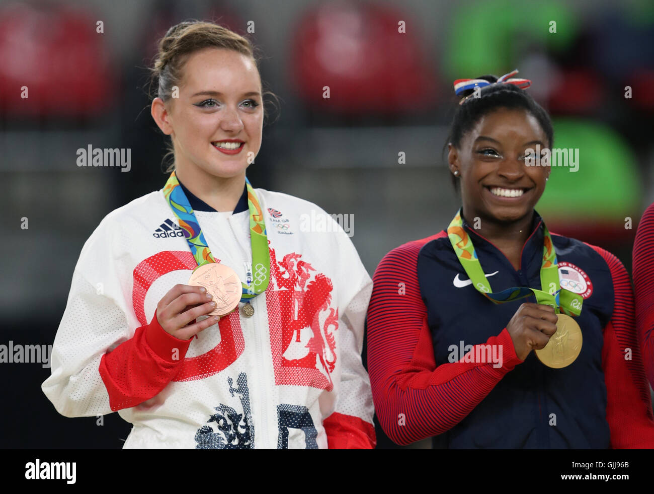Great Britain's Amy Tinkler celebrates a bronze meda with Gold medalist ...