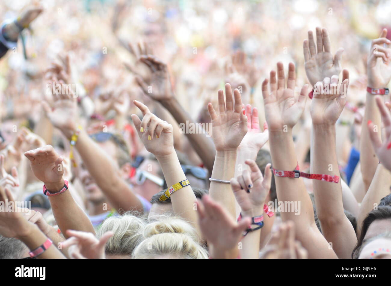 Waving arms in air hi-res stock photography and images - Alamy