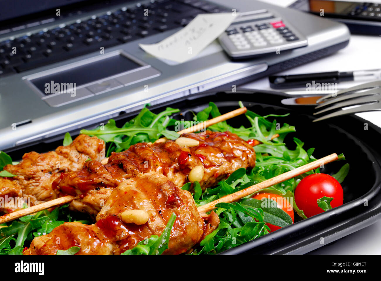 eating at work Stock Photo - Alamy