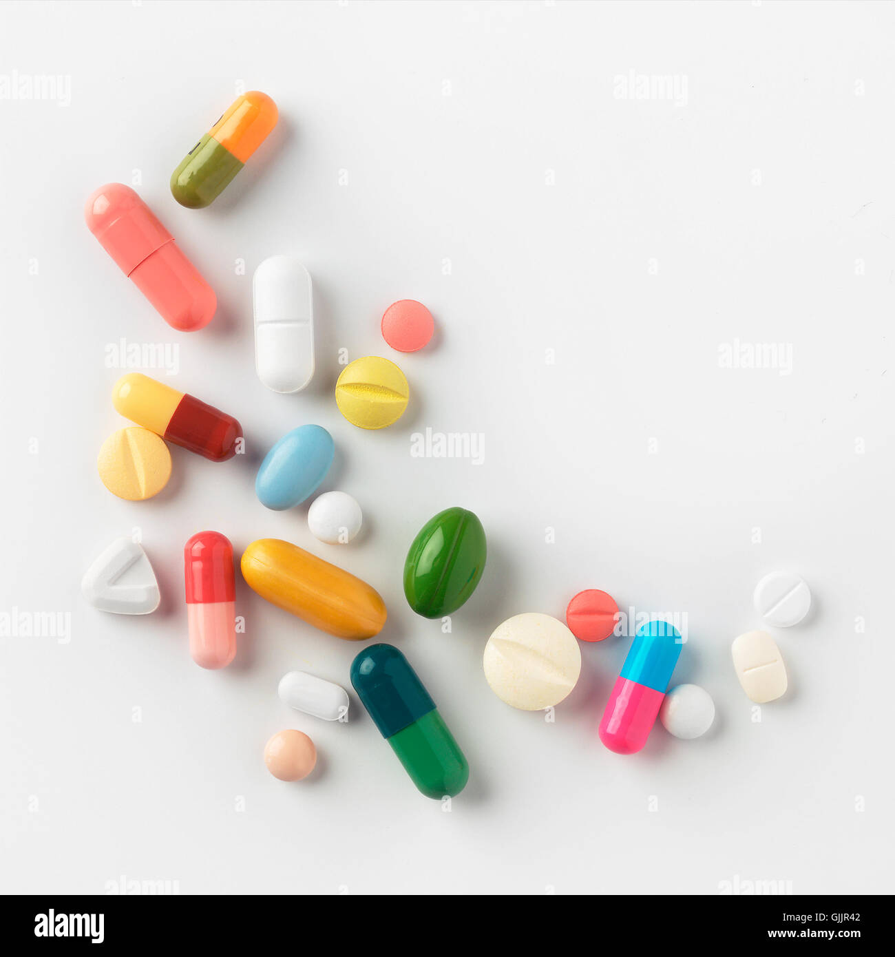 colorful tablets and capsules arrangement Stock Photo - Alamy