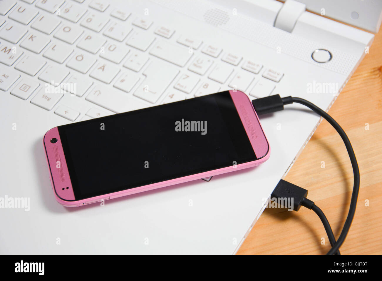 a pink smartphone Stock Photo - Alamy